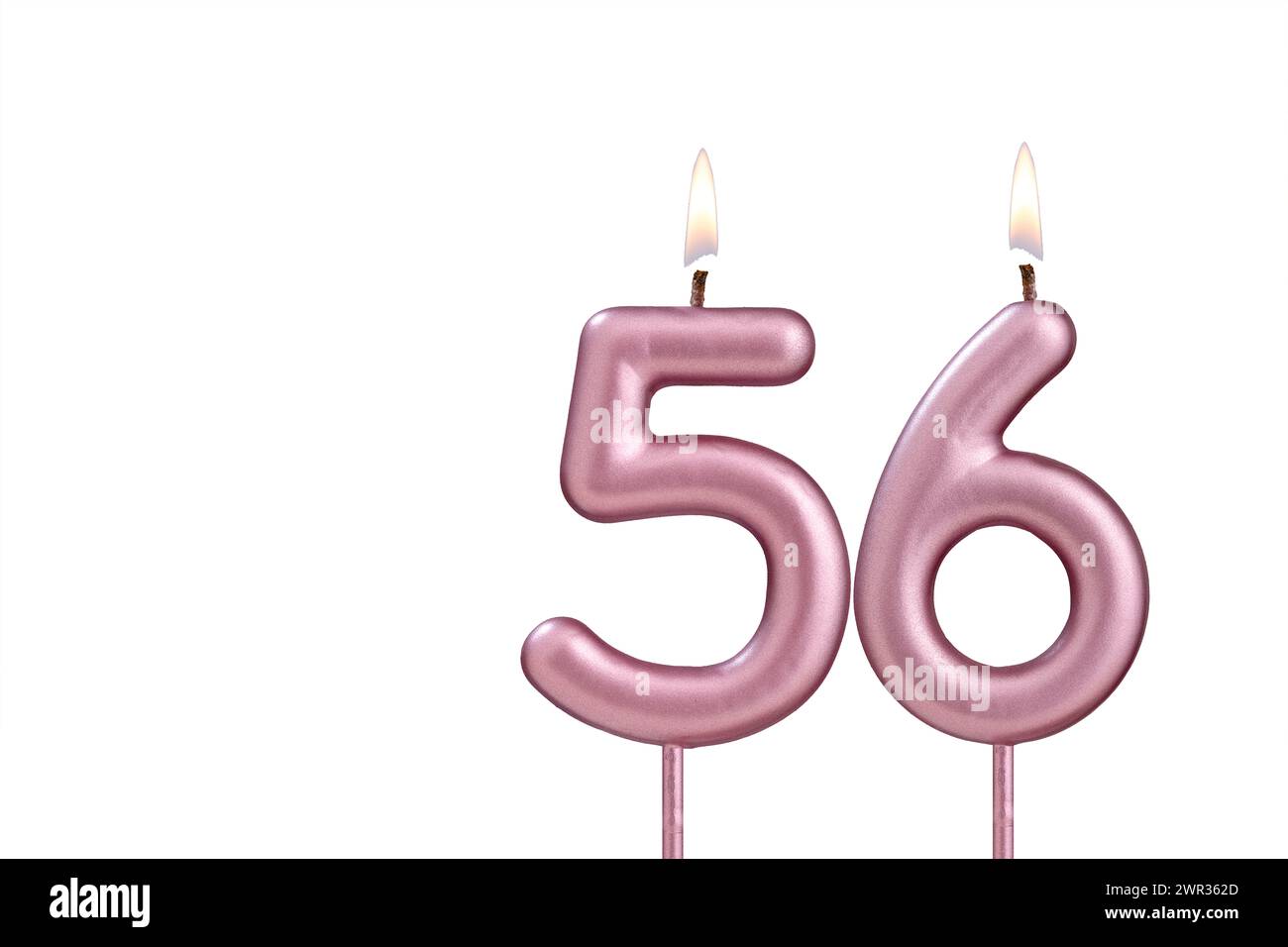 Lit birthday candle - Candle number 56 on white background Stock Photo ...