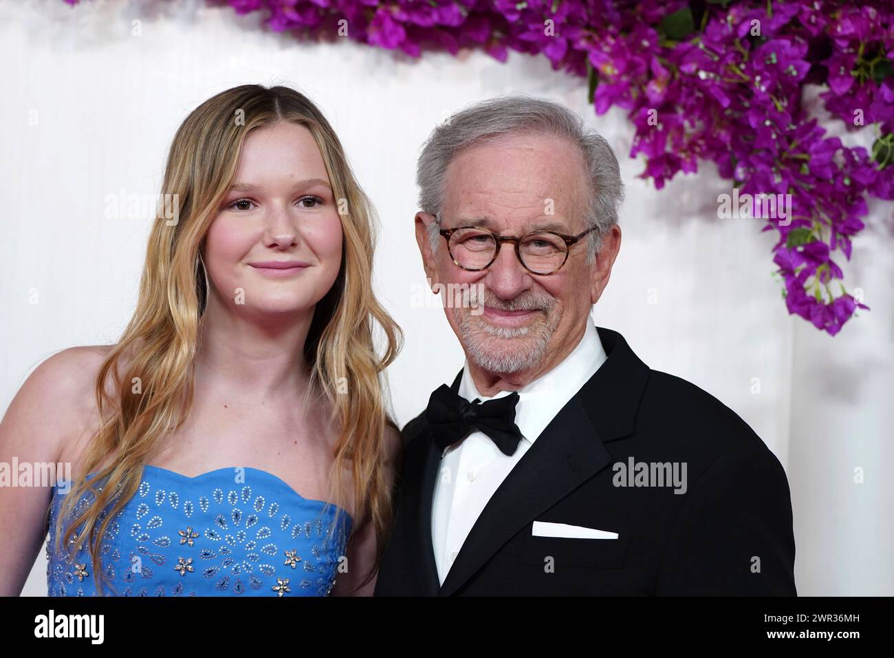 Eve Gavigan, left, and Steven Spielberg arrive at the Oscars on Sunday ...