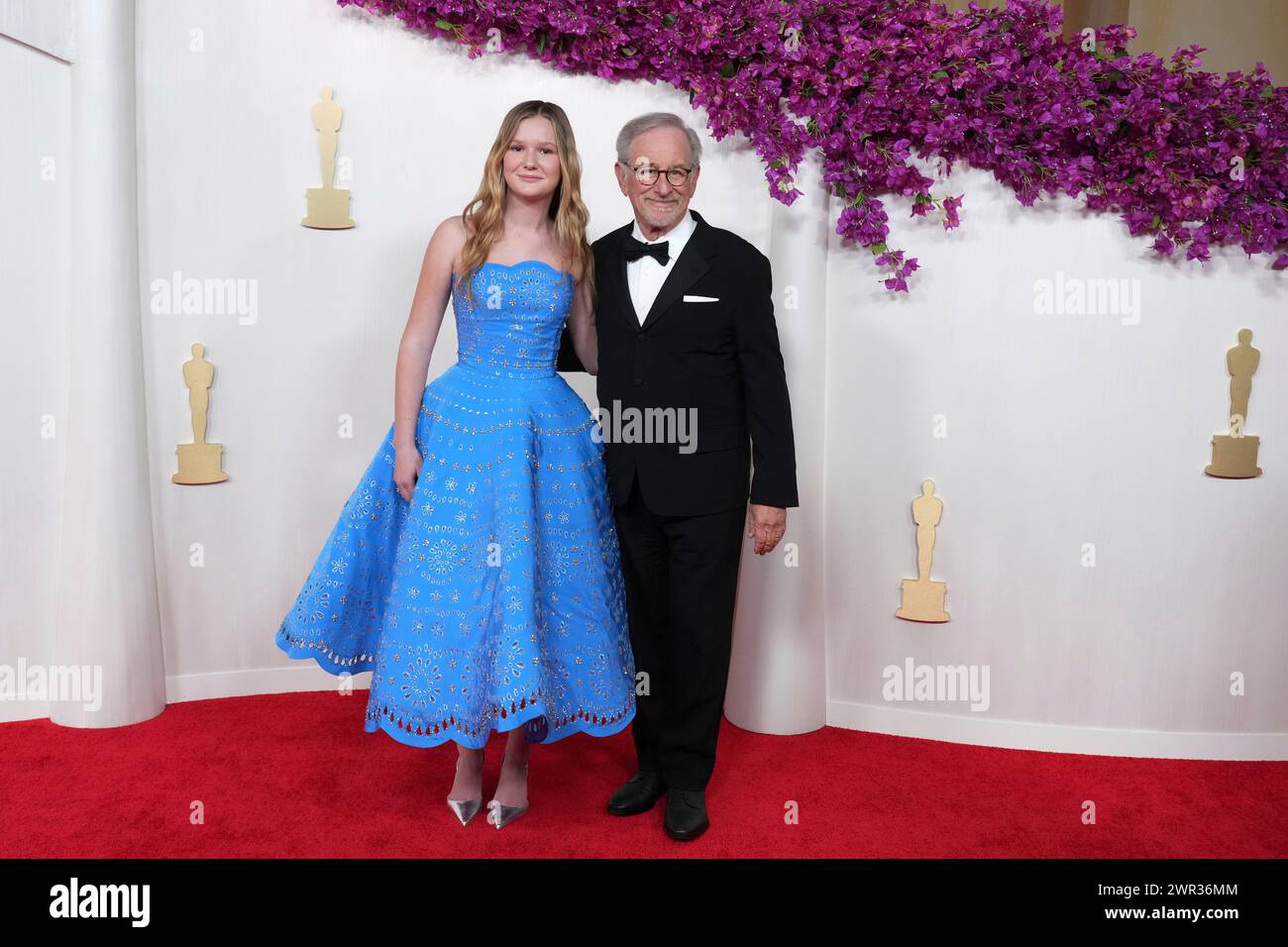 Eve Gavigan, left, and Steven Spielberg arrive at the Oscars on Sunday ...