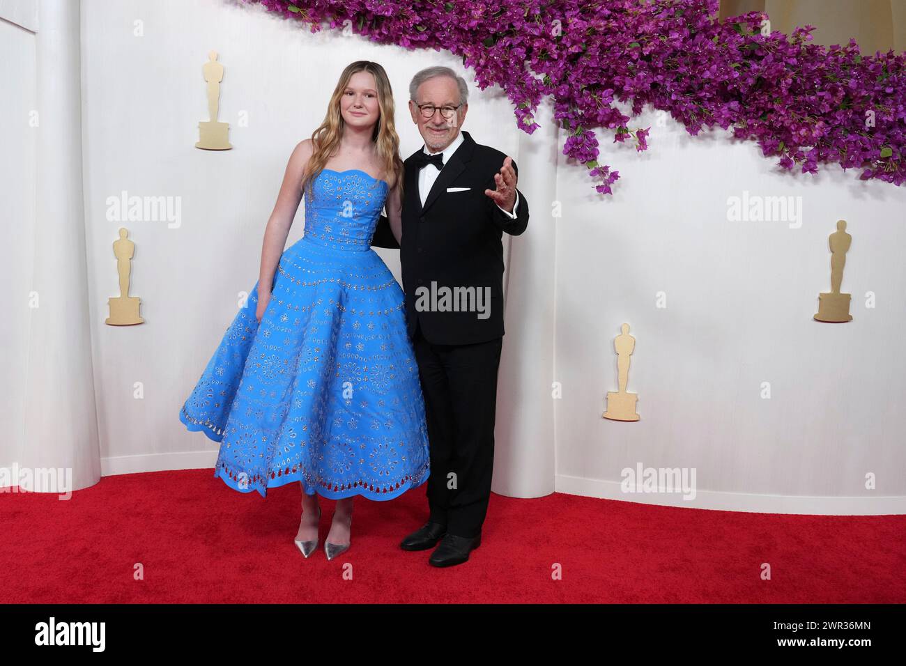 Eve Gavigan, left, and Steven Spielberg arrive at the Oscars on Sunday ...