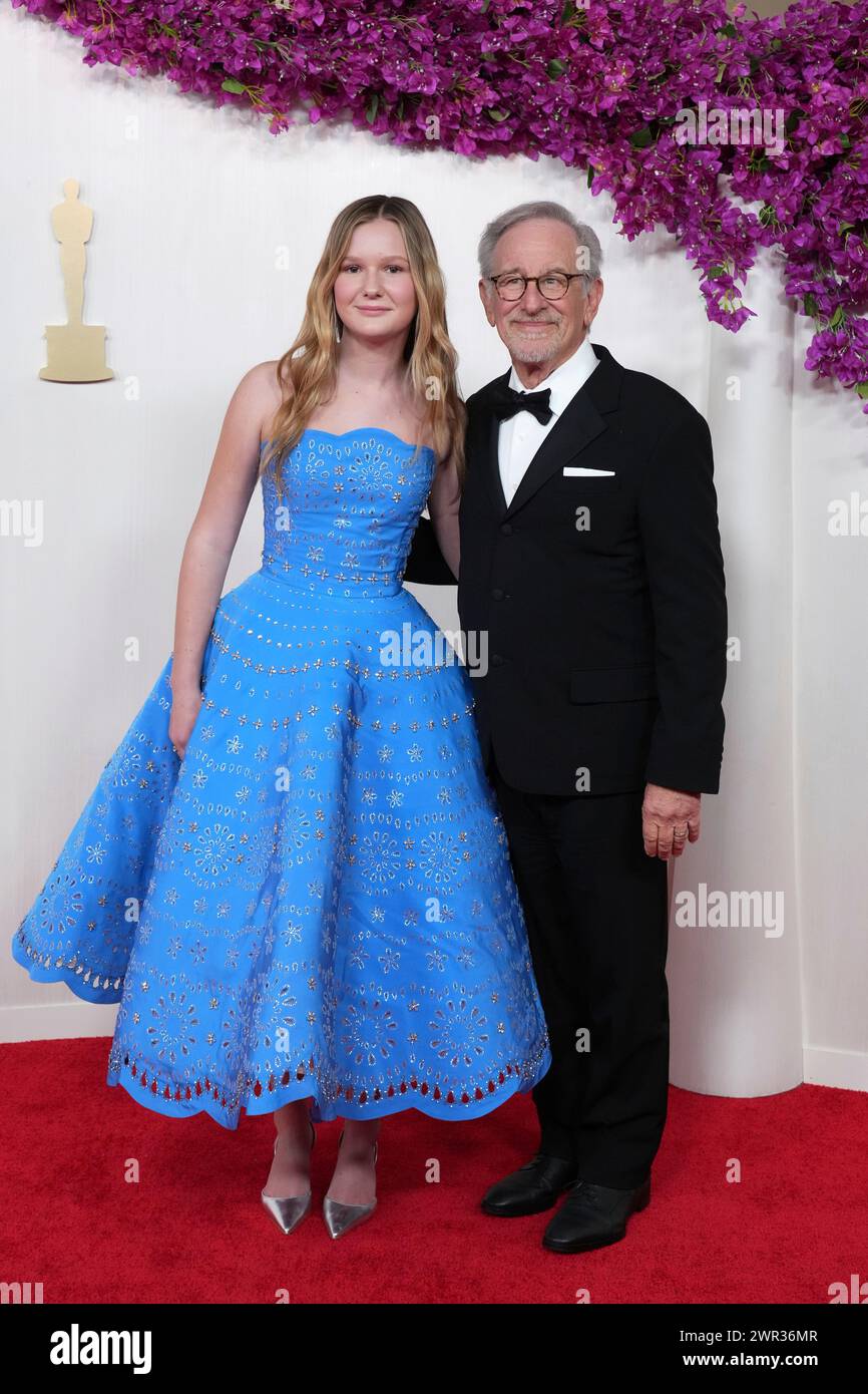 Eve Gavigan, left, and Steven Spielberg arrive at the Oscars on Sunday ...