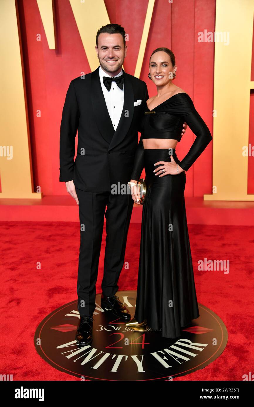 Ben Winston, left, and Meredith Winston arrive at the Vanity Fair Oscar ...
