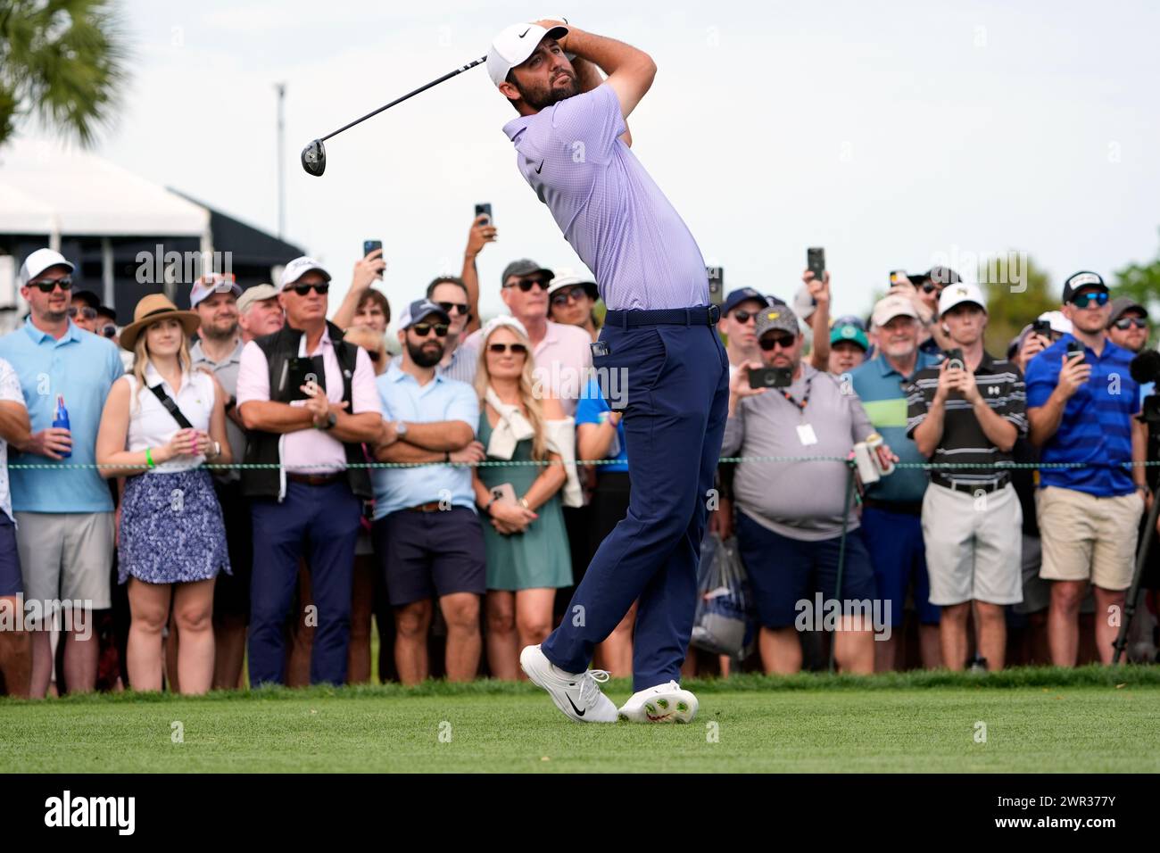 Scottie Scheffler hits a shot from the 15th tee during the final round ...