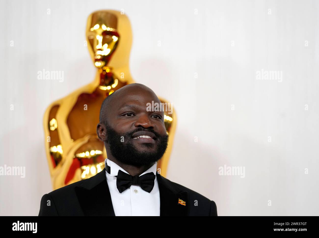 Moses Bwayo arrives at the Oscars on Sunday, March 10, 2024, at the ...