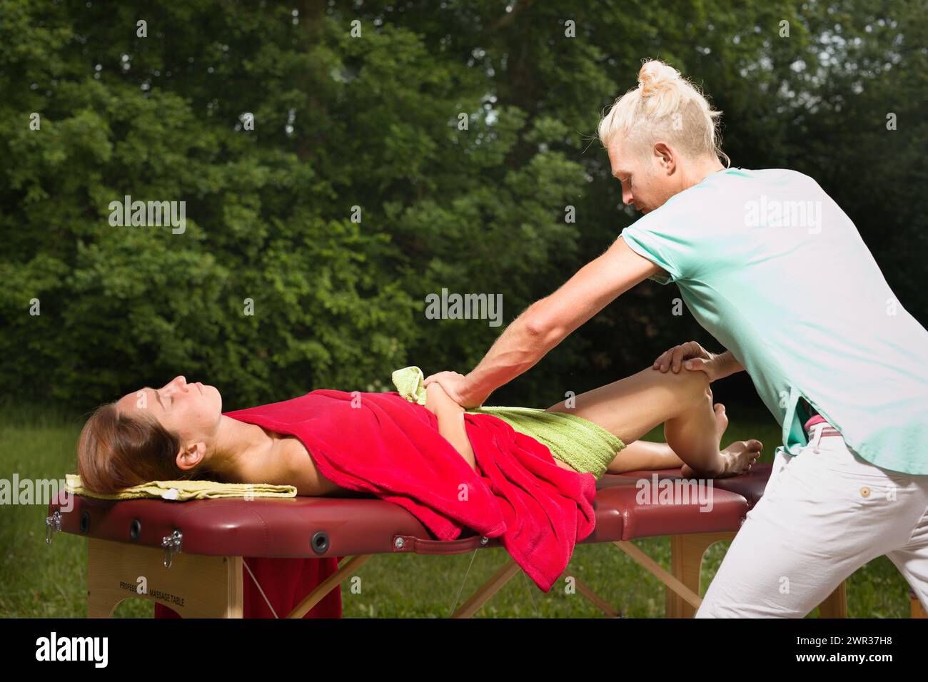 Woman receiving oil massage hi-res stock photography and images - Alamy