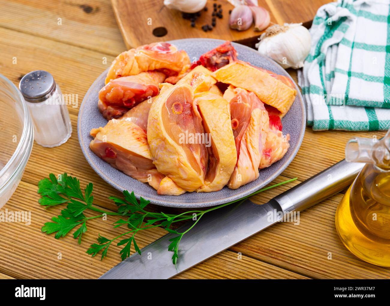Fresh raw chopped chicken pieces Stock Photo - Alamy