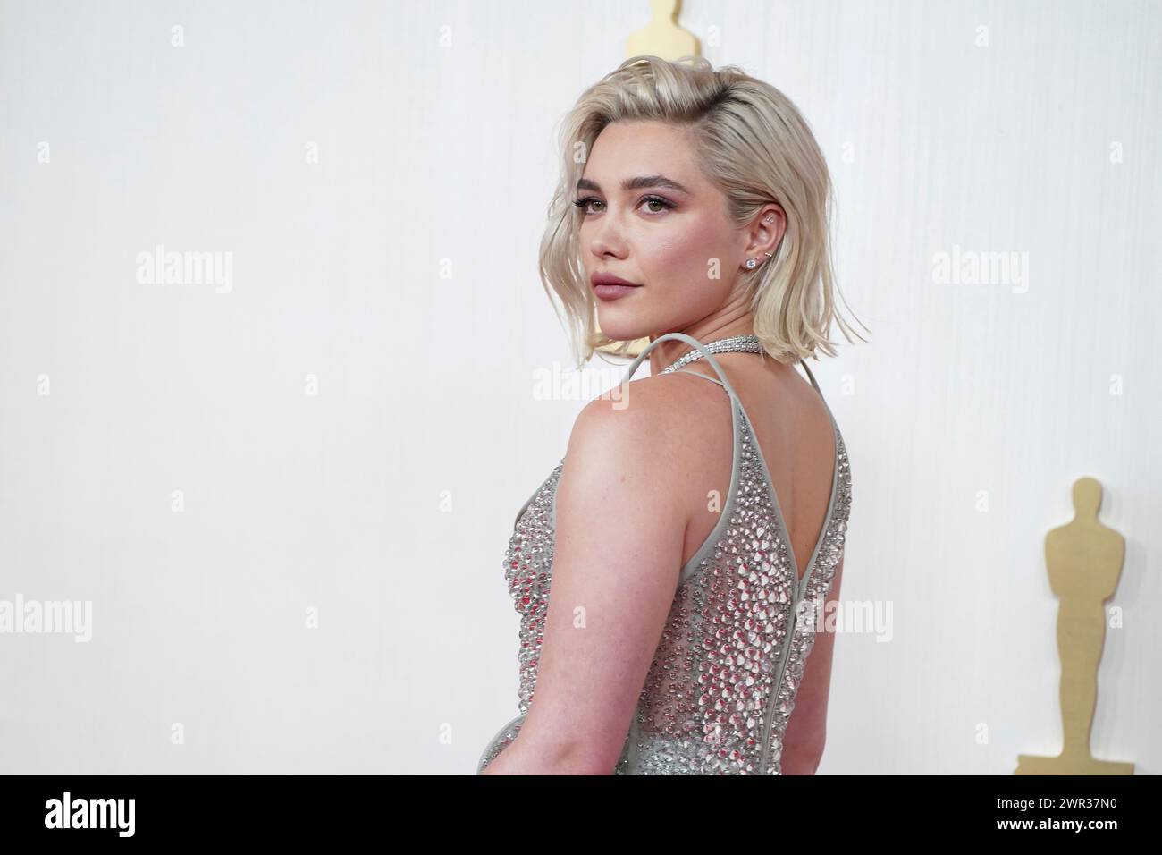 Florence Pugh arrives at the Oscars on Sunday, March 10, 2024, at the ...