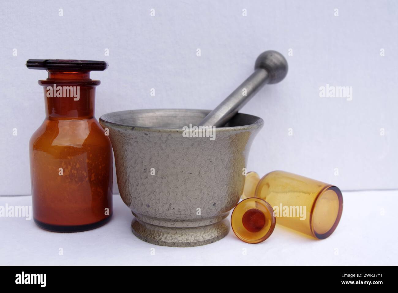 Mortar, pestle, pharmacy, antique, cast iron, glass jar, amber glass, This old pill mortar made ...