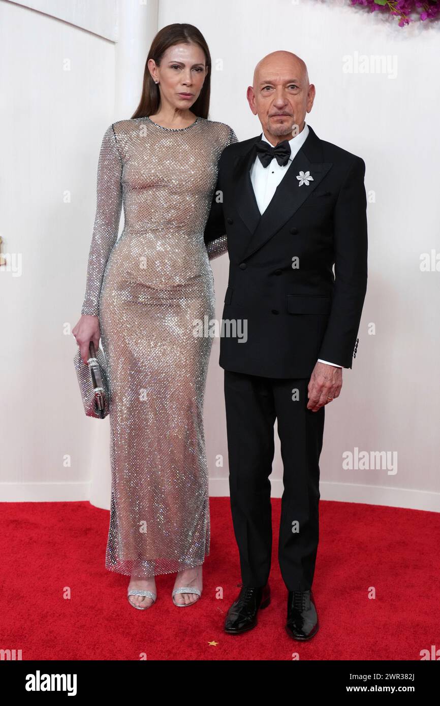 Daniela Lavender, left, and Ben Kingsley arrives at the Oscars on ...