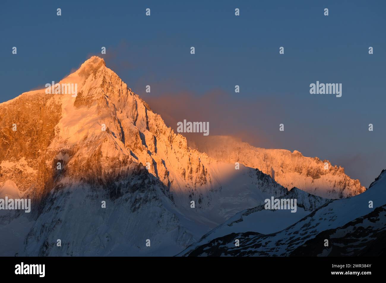 The heavily glaciated summit of Cerro San Lorenzo at sunrise, Perito ...