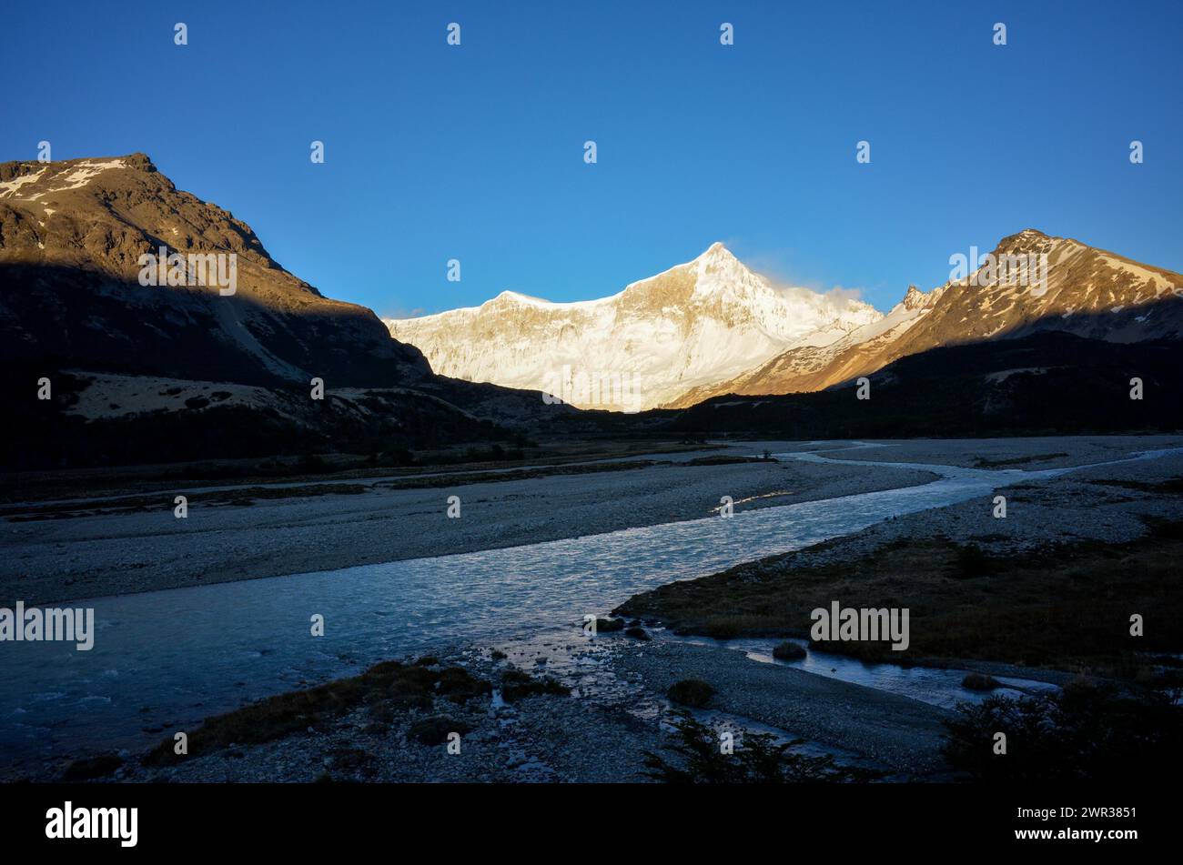The summit of the glaciated Cerro San Lorenzo at sunrise, Perito Moreno ...