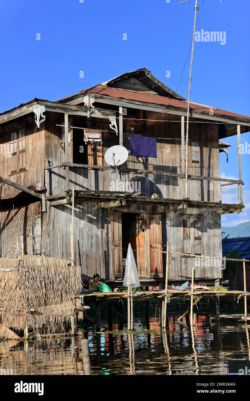 Old weathered stilt house with satellite dish, Inle Lake, Myanmar Stock ...
