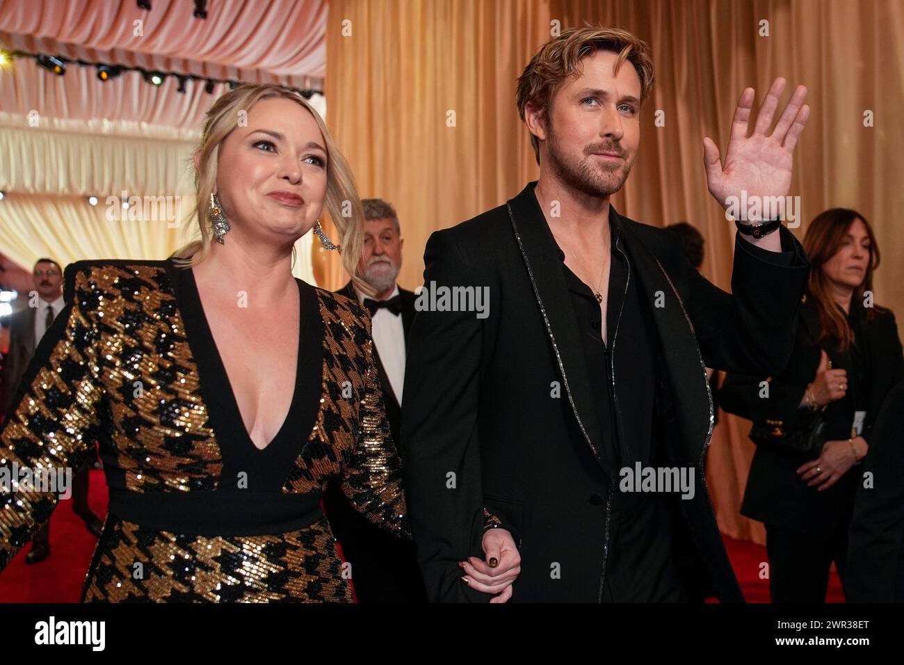 Mandi Gosling, left, and Ryan Gosling arrive at the Oscars on Sunday ...