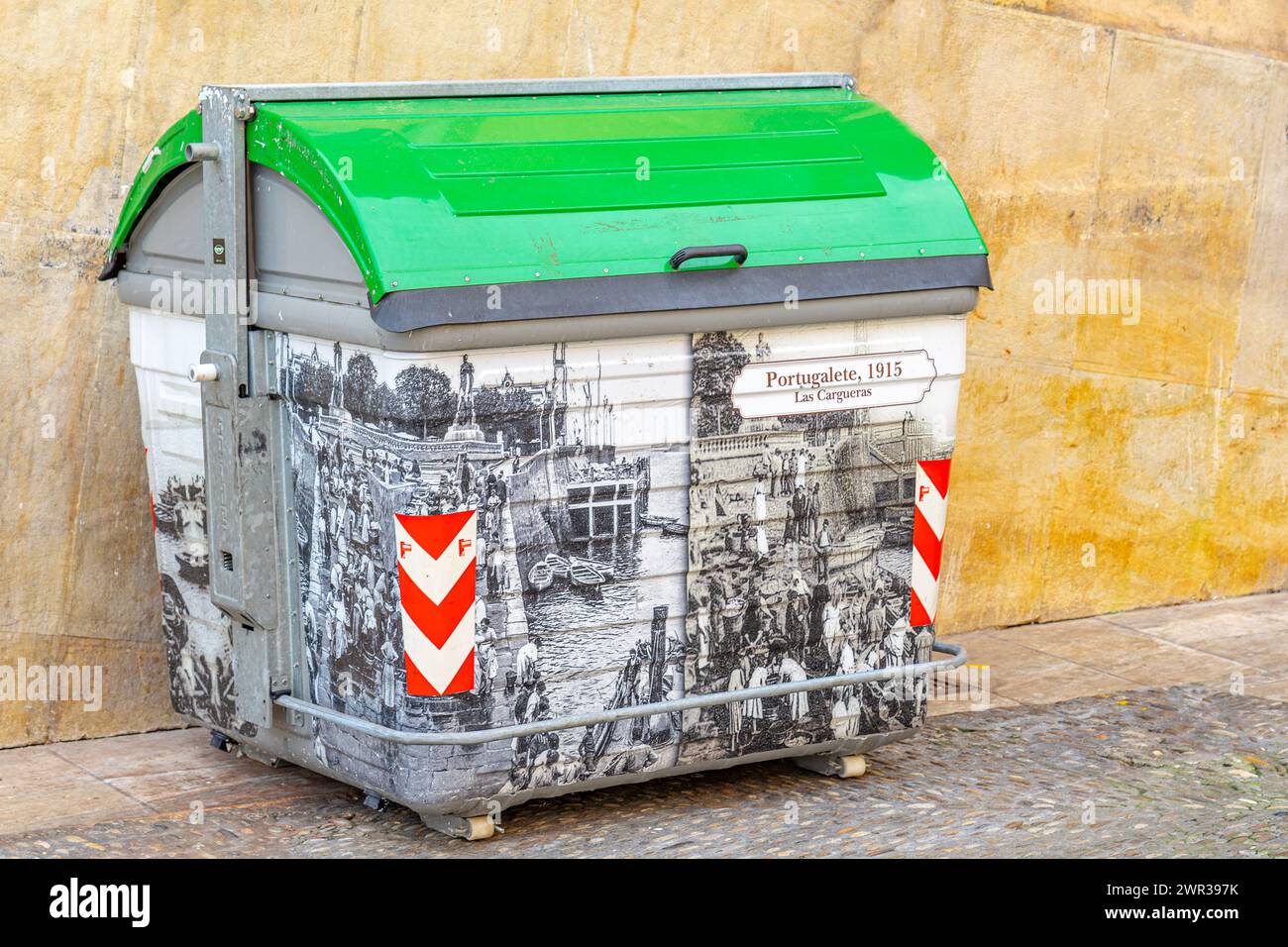 Municipal organic waste container with decoration alluding to ...