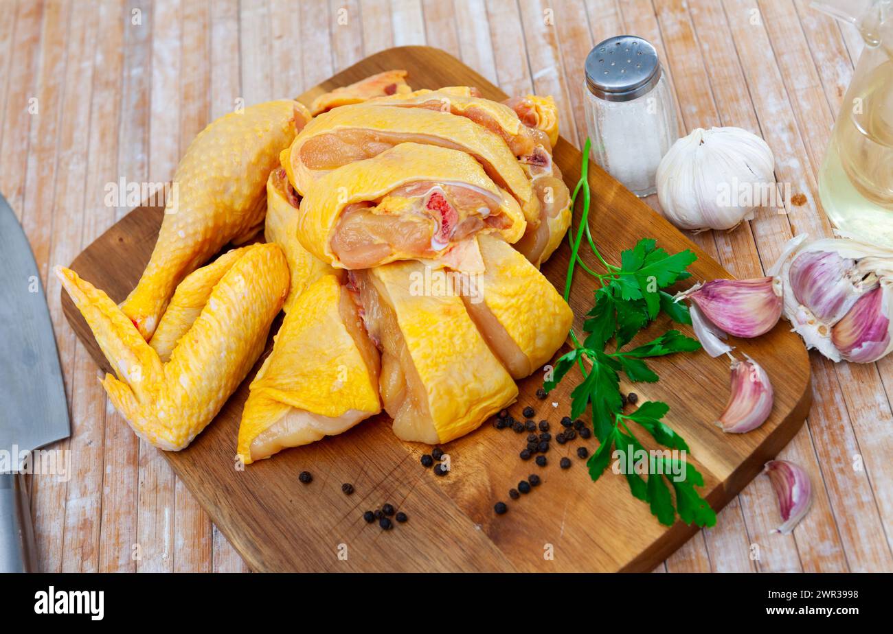 Fresh raw chopped chicken pieces Stock Photo - Alamy