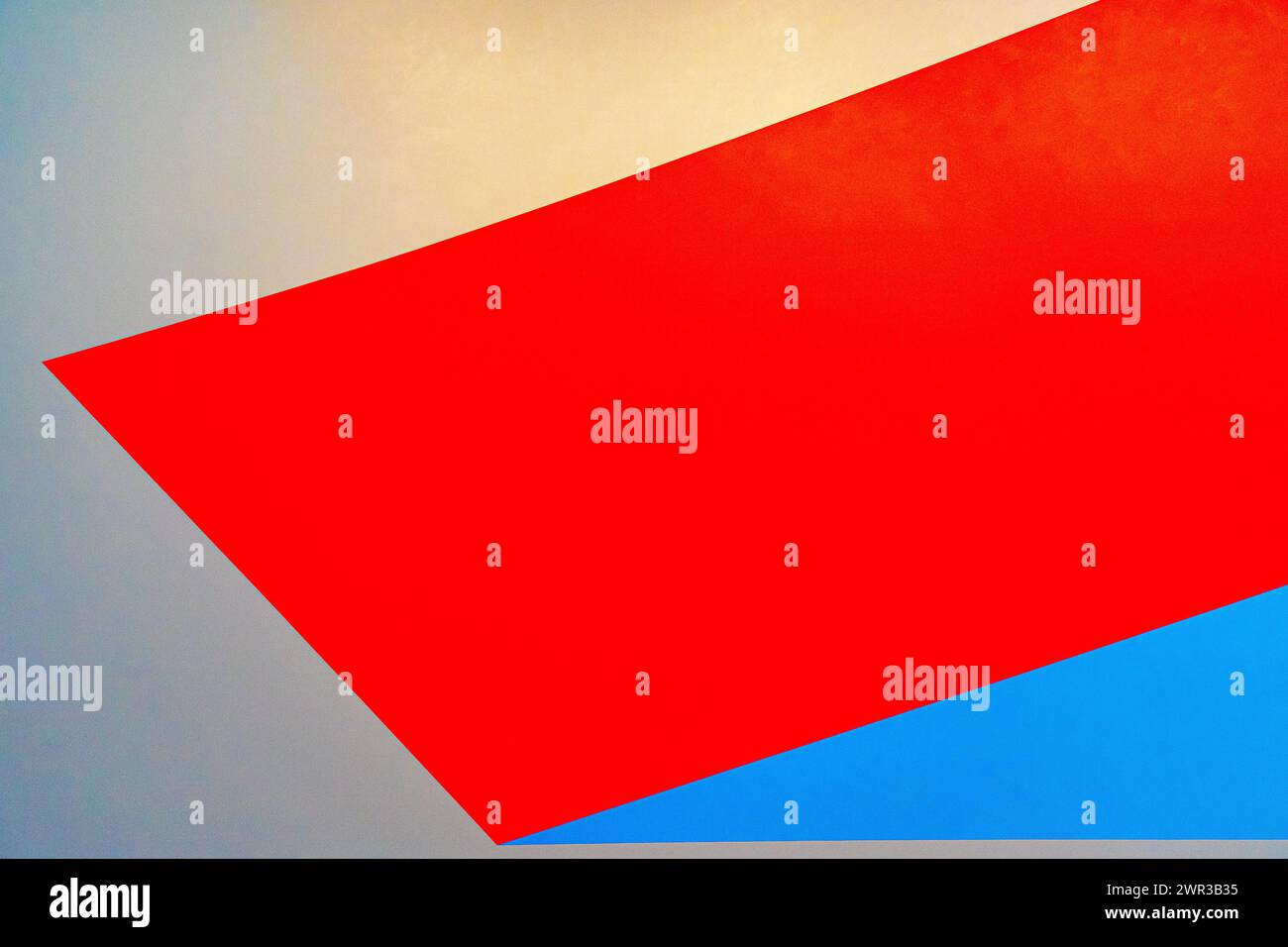 frame with two strong colors, red and blue framed in an asymmetrical ...