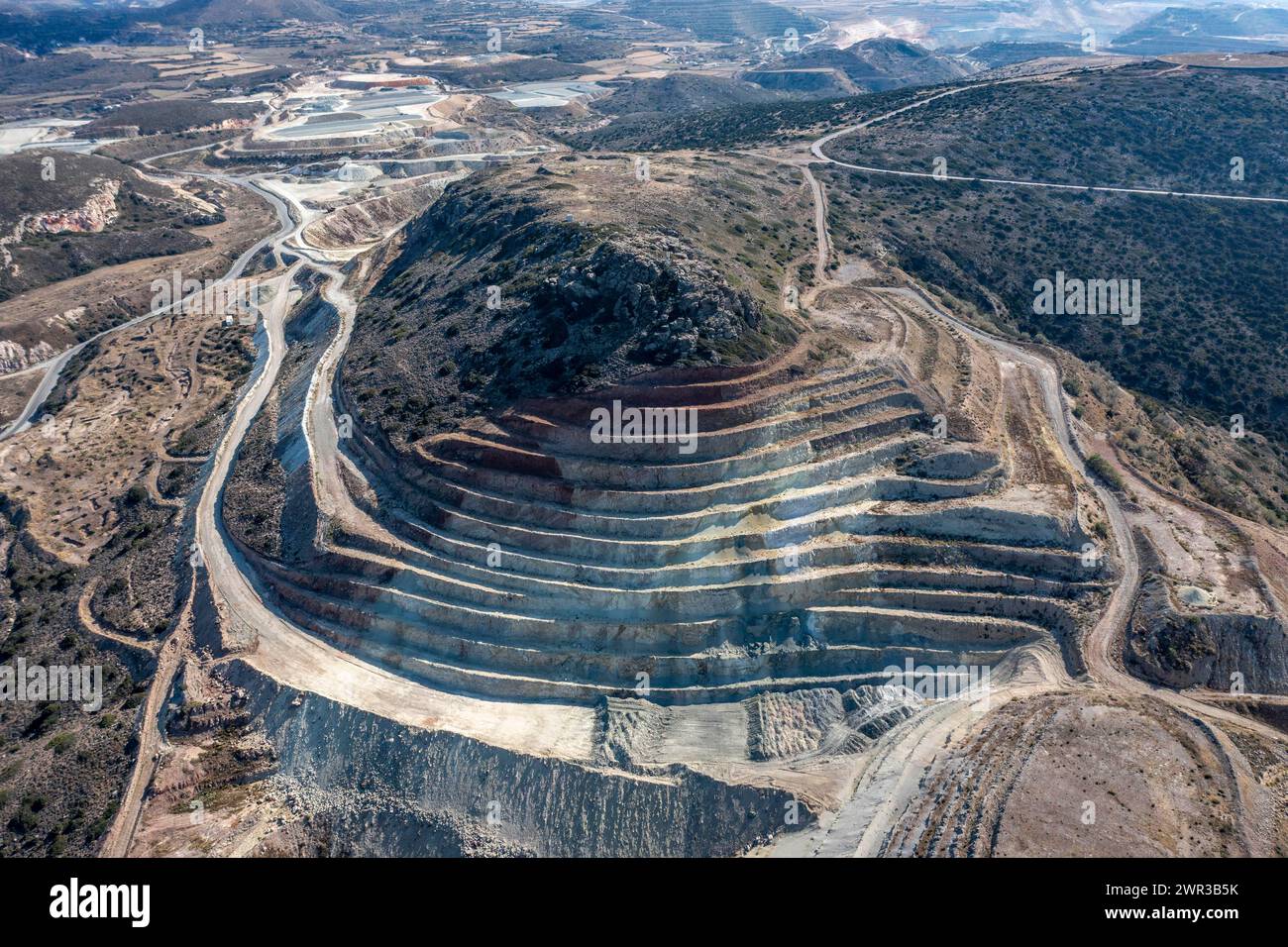 Mineral mining in the mountains near Apollonia, aerial view, Milos ...