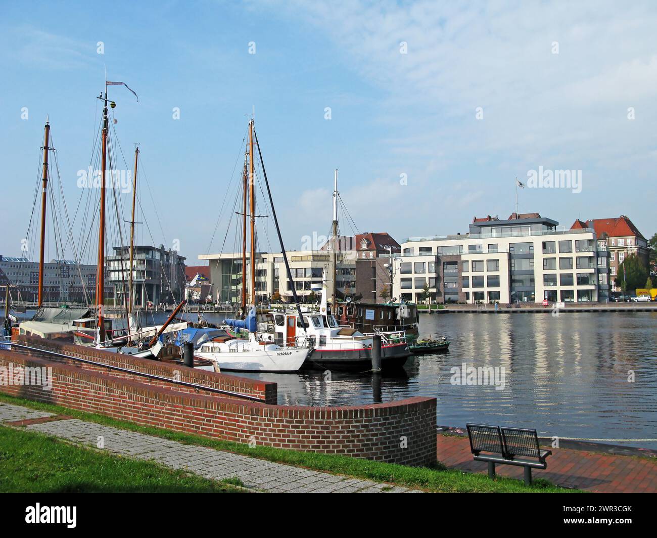 Boats, bench, Emden harbour, East Frisia, Germany Stock Photo - Alamy