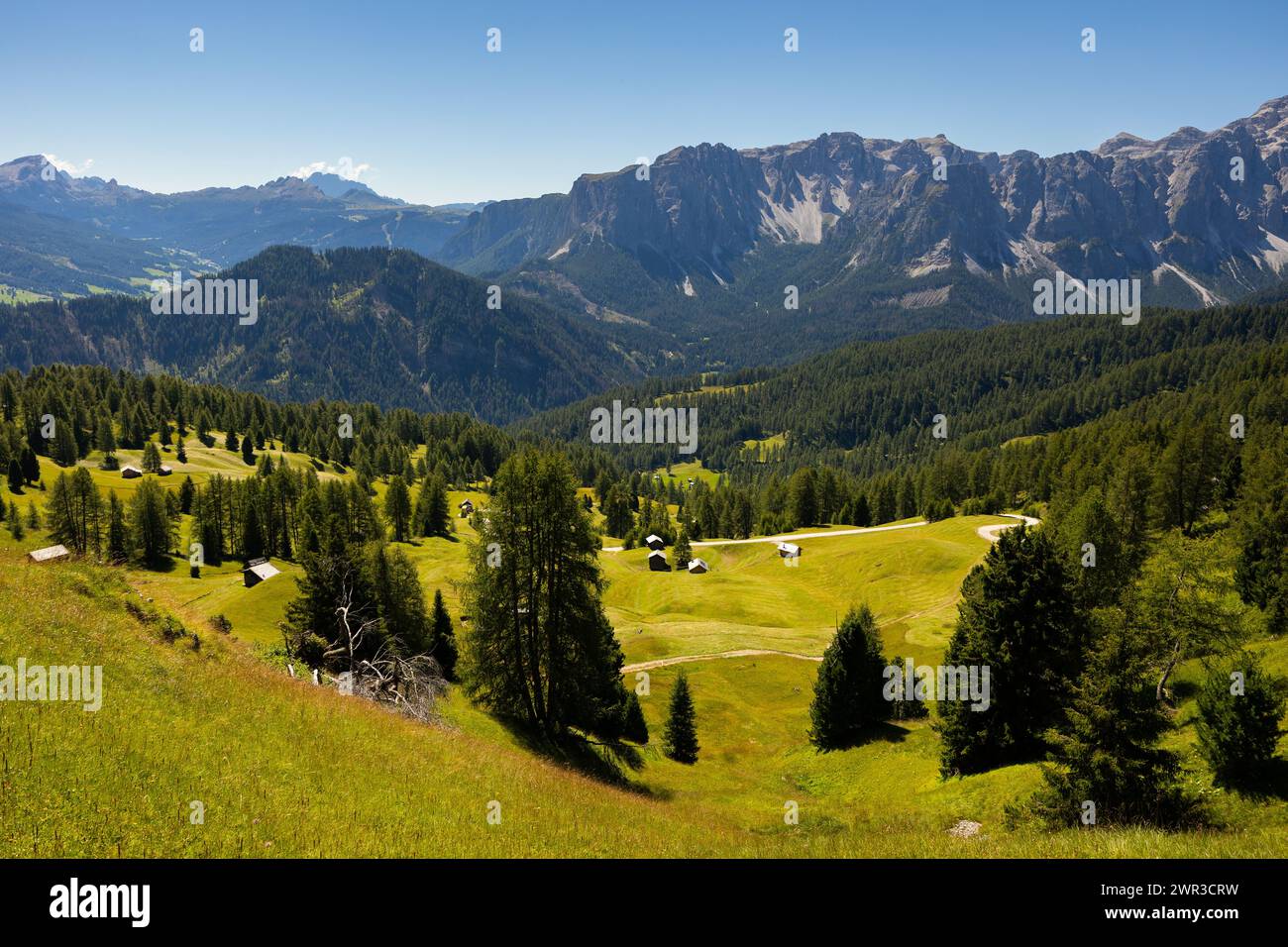 Wooden farm building on hillside in area pass Goma Dolomites Stock ...