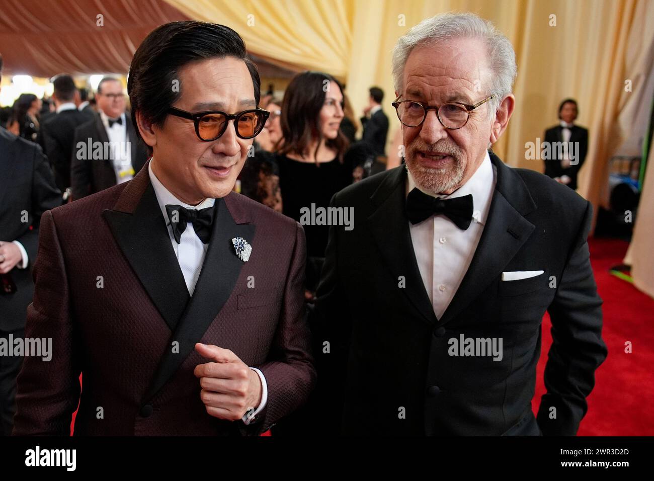 Ke Huy Quan, left, and Steven Spielberg arrive at the Oscars on Sunday ...