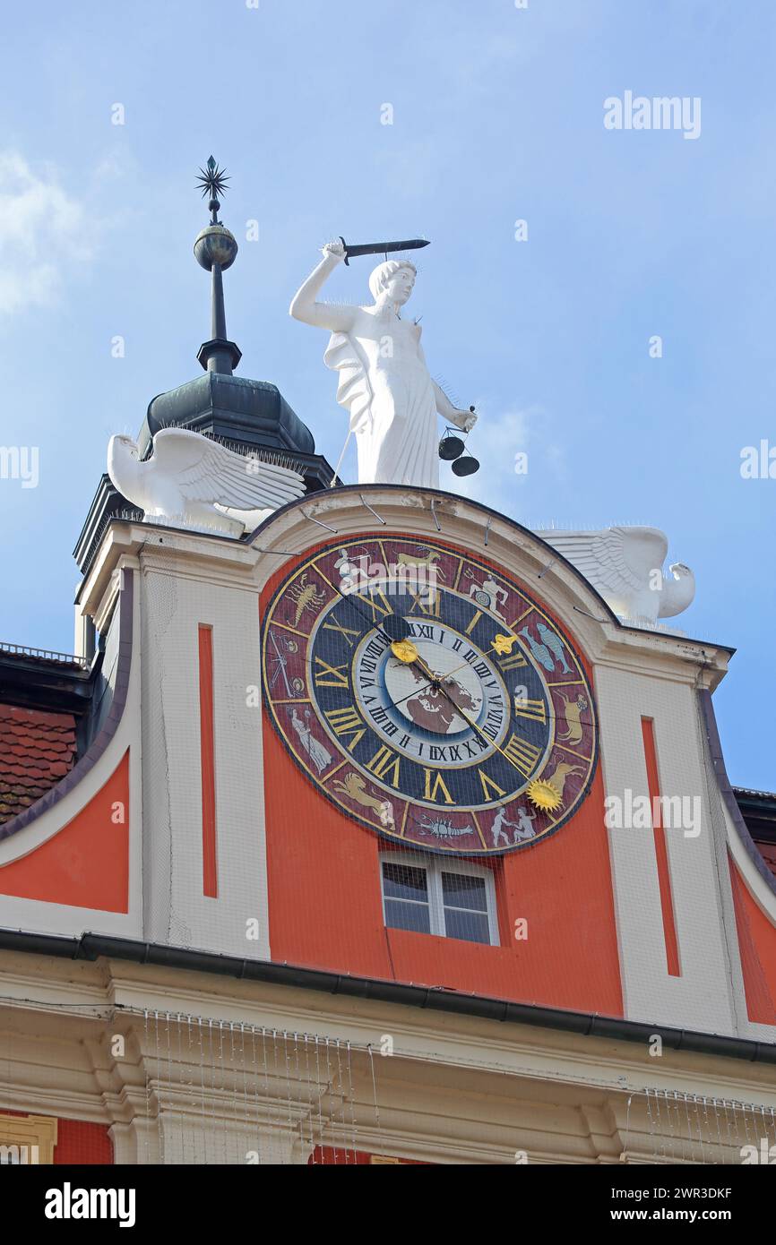 Pediment and clock with zodiac signs and Justitia with decorations on ...