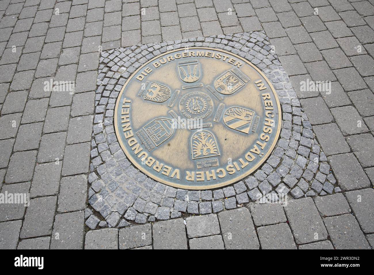 Medallion and memorial plaque to twin towns, inscription, mayor ...