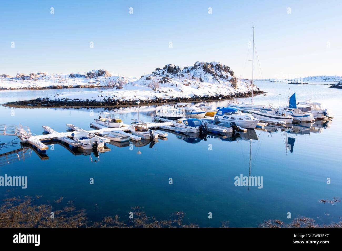 Lofoten, Norway. Solvaer, Nordland province. Pleasure craft in a side ...