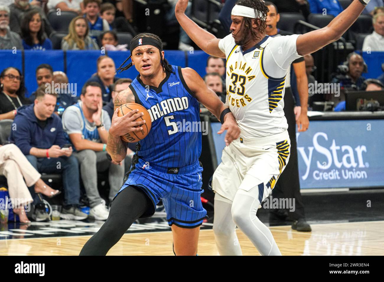 Orlando, Florida, USA, March 10, 2024, Orlando Magic forward Paolo Banchero #5 attempt to run ...