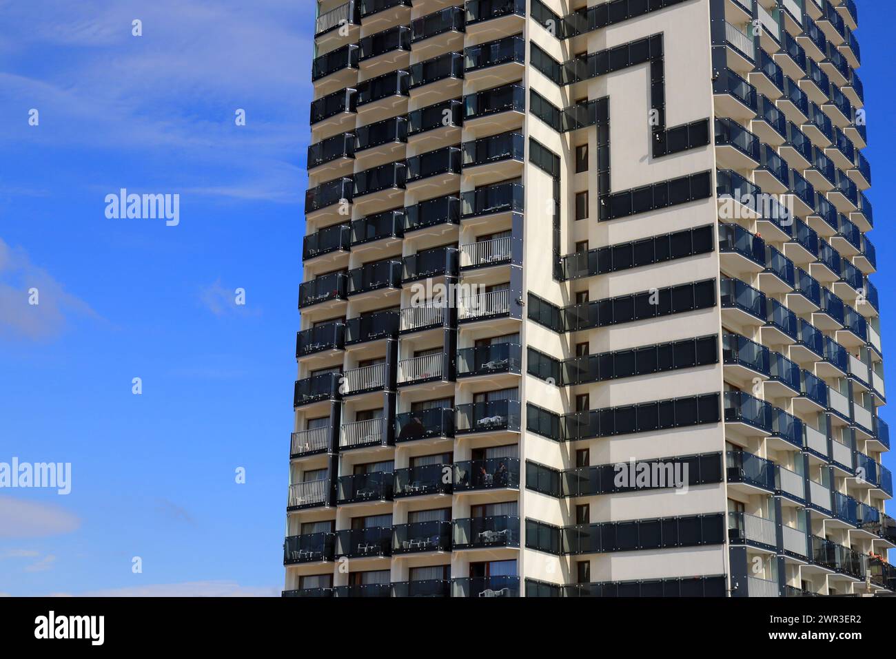 High-rise blue building, skyscraper with balconies, hotel tower, office ...