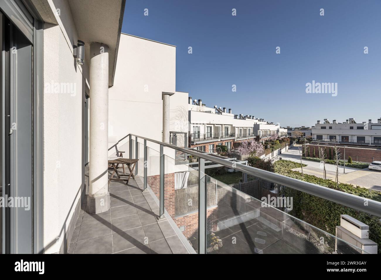 A small terrace with views in a two-story building Stock Photo - Alamy