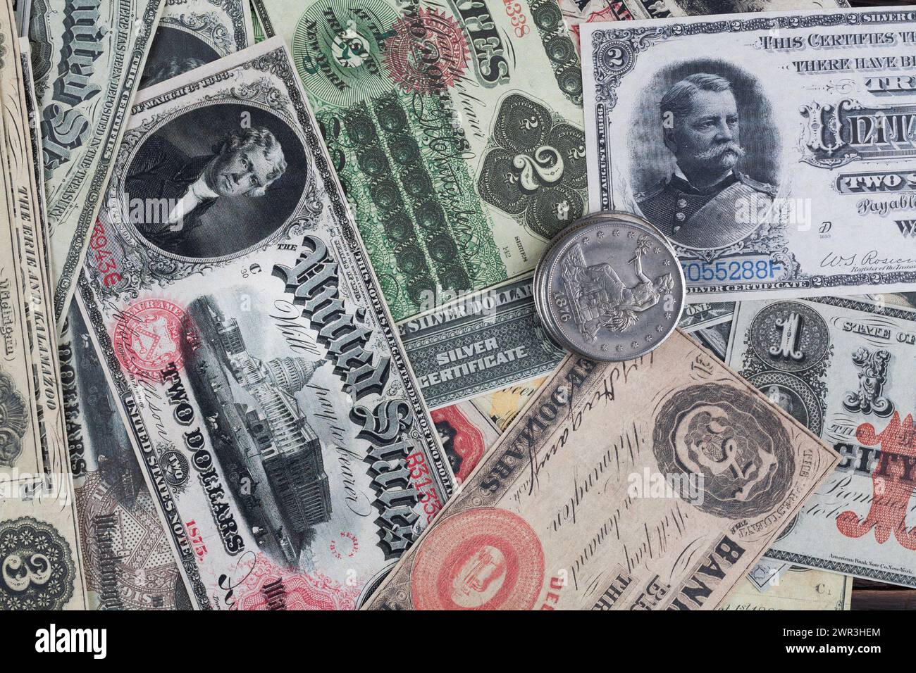 Old west period US banknotes and silver certificates with silver dollar ...