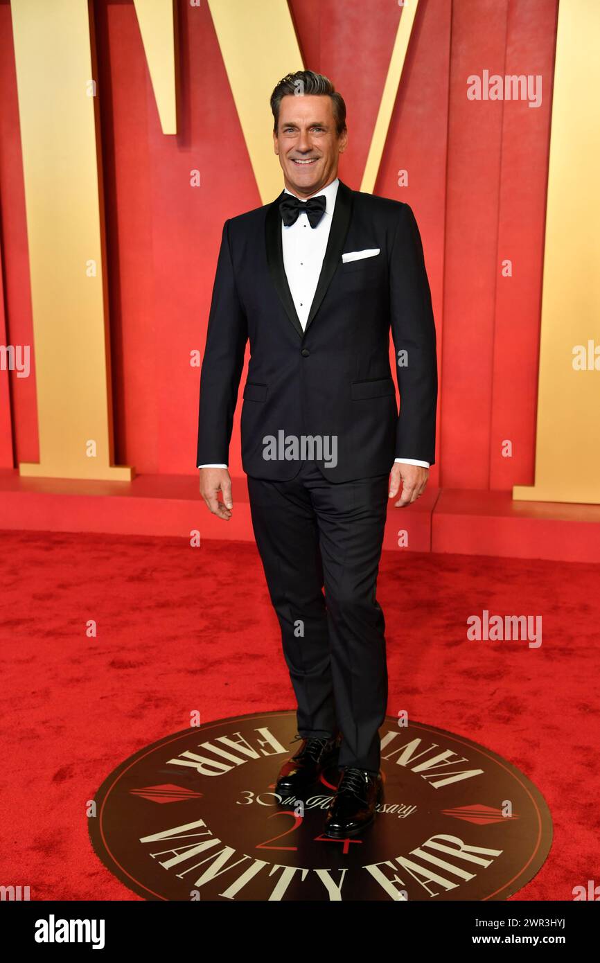 Jon Hamm arrives at the Vanity Fair Oscar Party on Sunday, March 10 ...