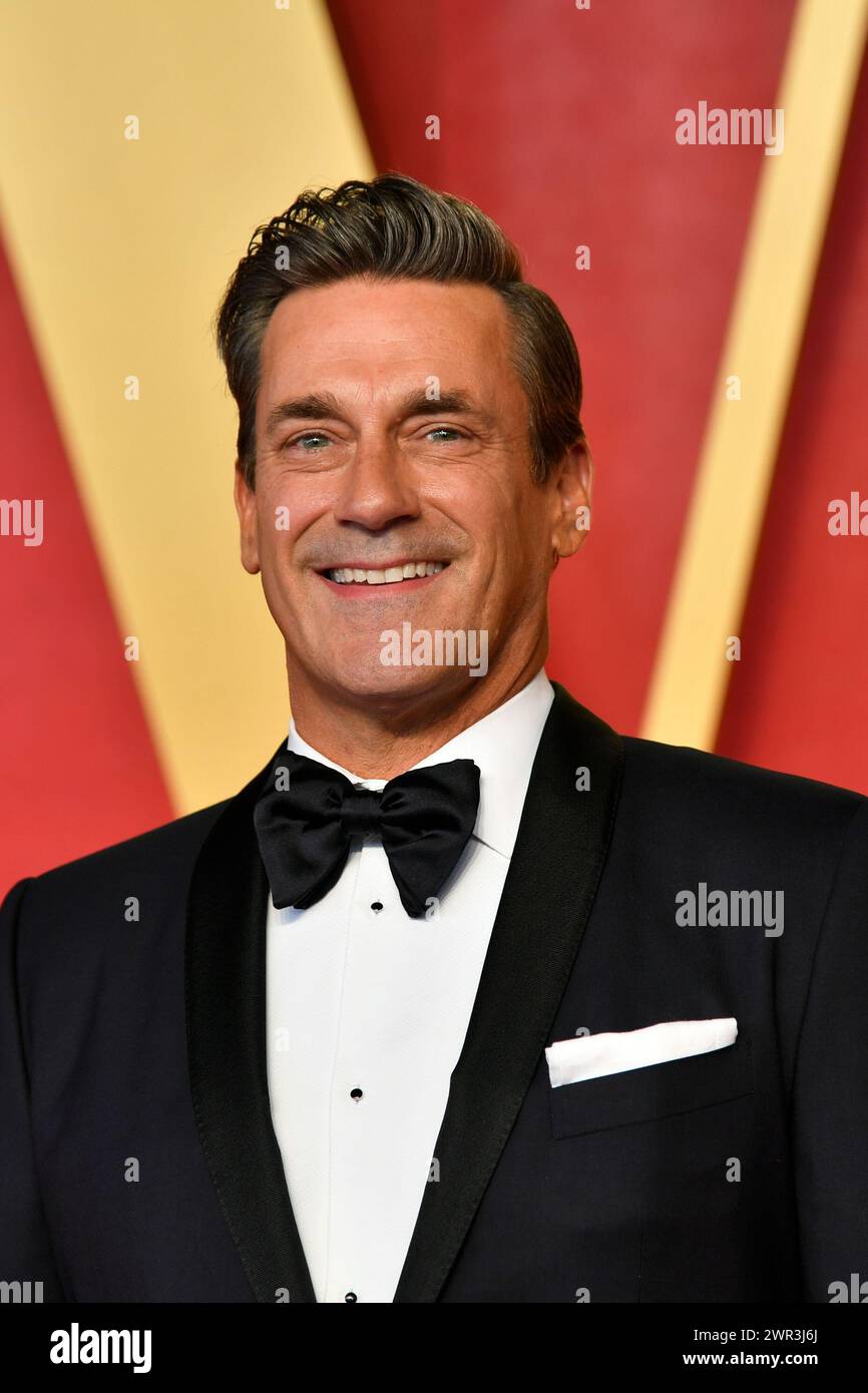 Jon Hamm arrives at the Vanity Fair Oscar Party on Sunday, March 10 ...
