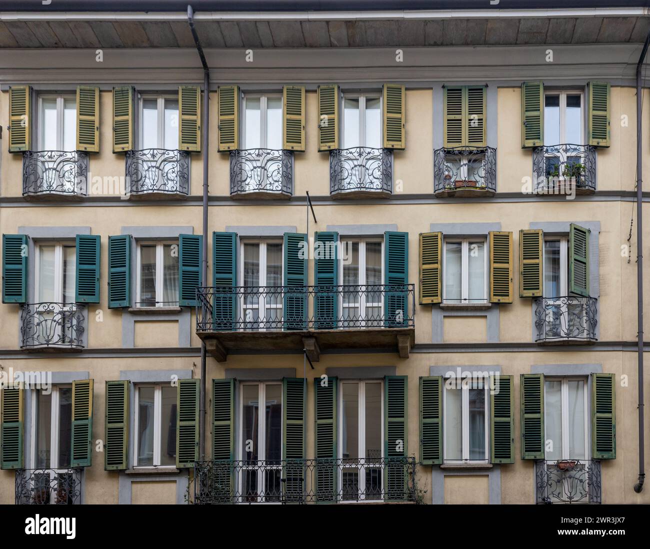 The beautiful facade of the building in the streets of Milan, Italy ...