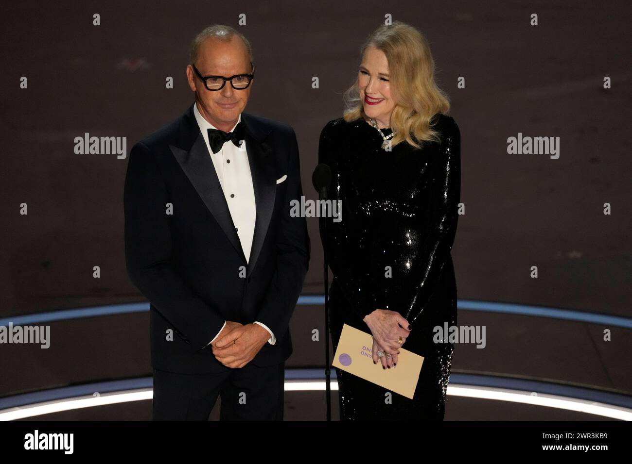 Michael Keaton, left, and Catherine O'Hara presents the award for best ...
