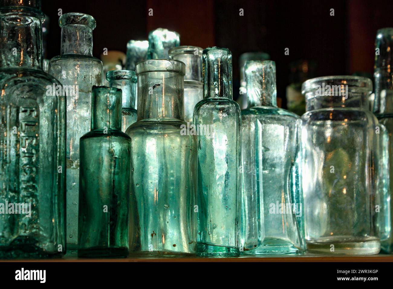 Collection of antique and vintage glass bottles Stock Photo - Alamy