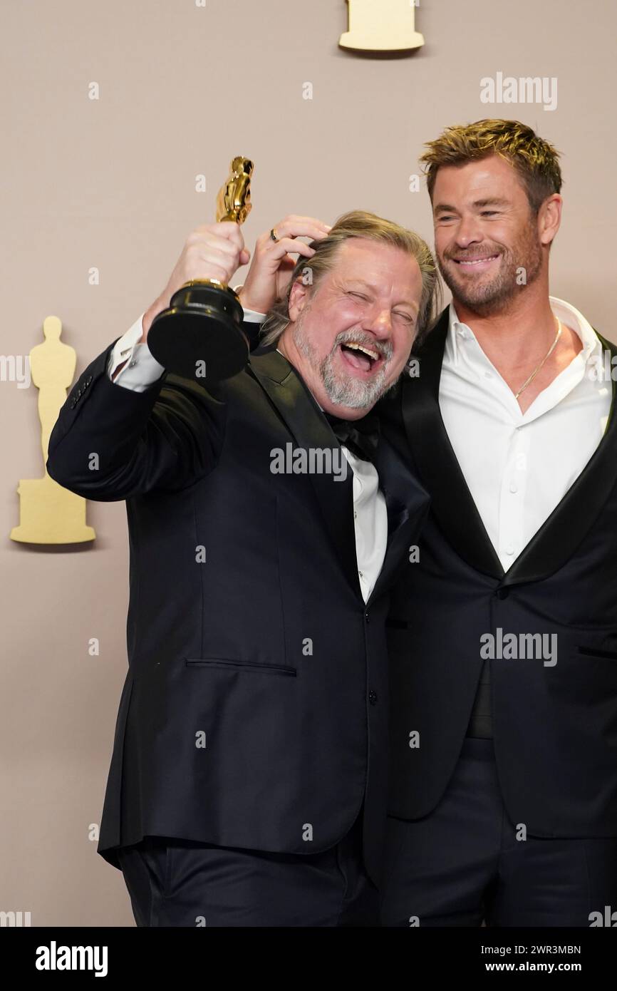 Dave Mullins, left, winner of the award for best animated short for ...