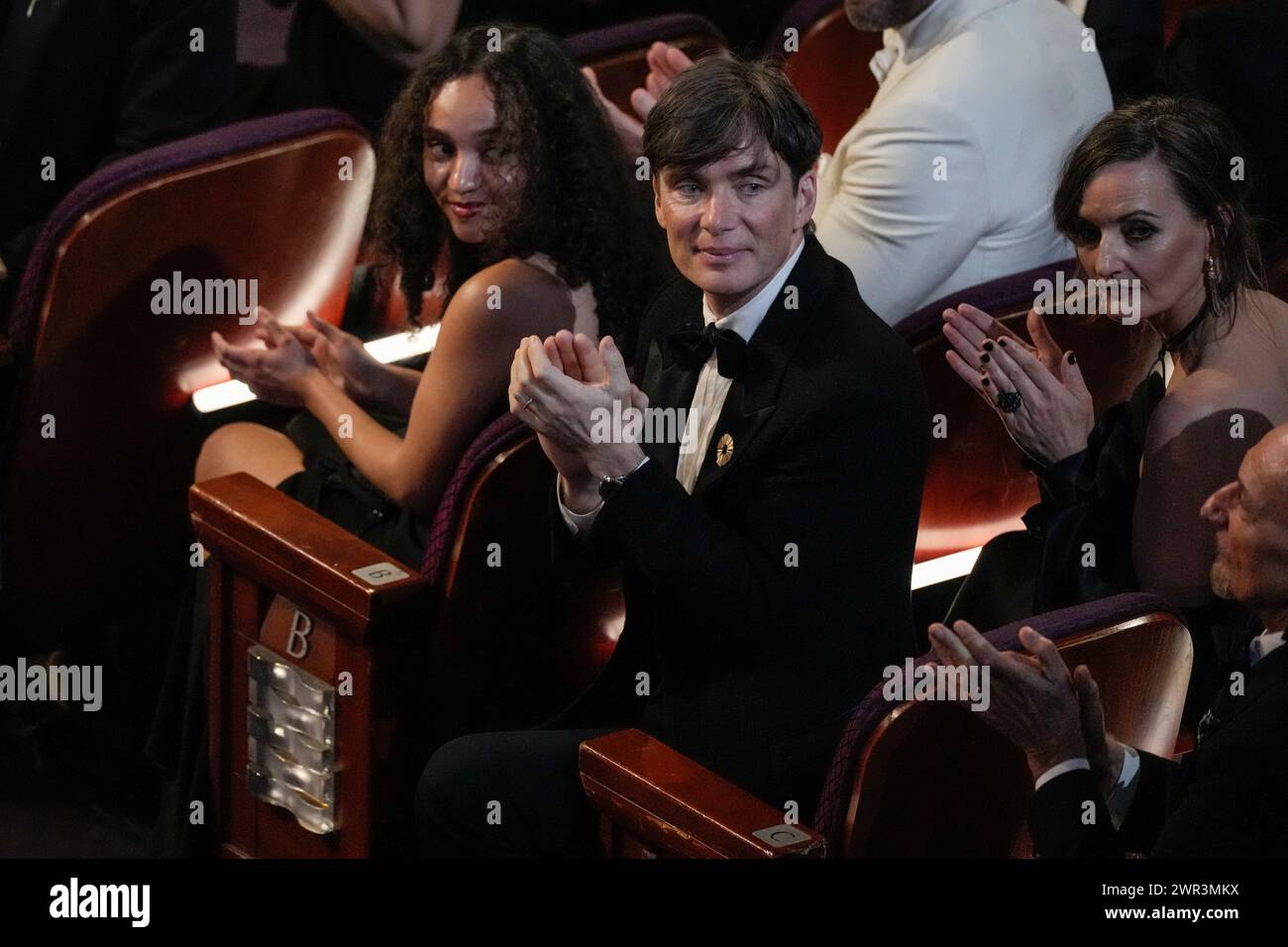 Cillian Murphy applauds during the Oscars on Sunday, March 10, 2024, at ...