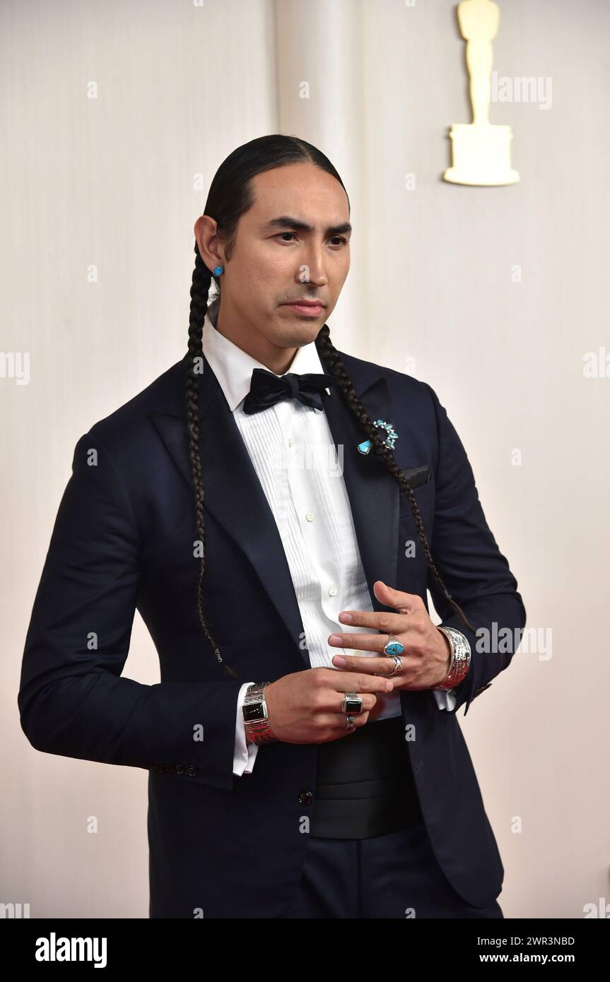 Tatanka Means arrives at the Oscars on Sunday, March 10, 2024, at the ...