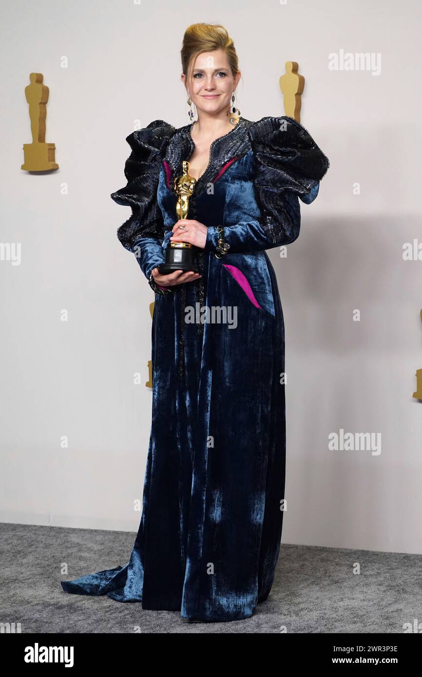 Holly Waddington poses with the award for best costume design for "Poor ...