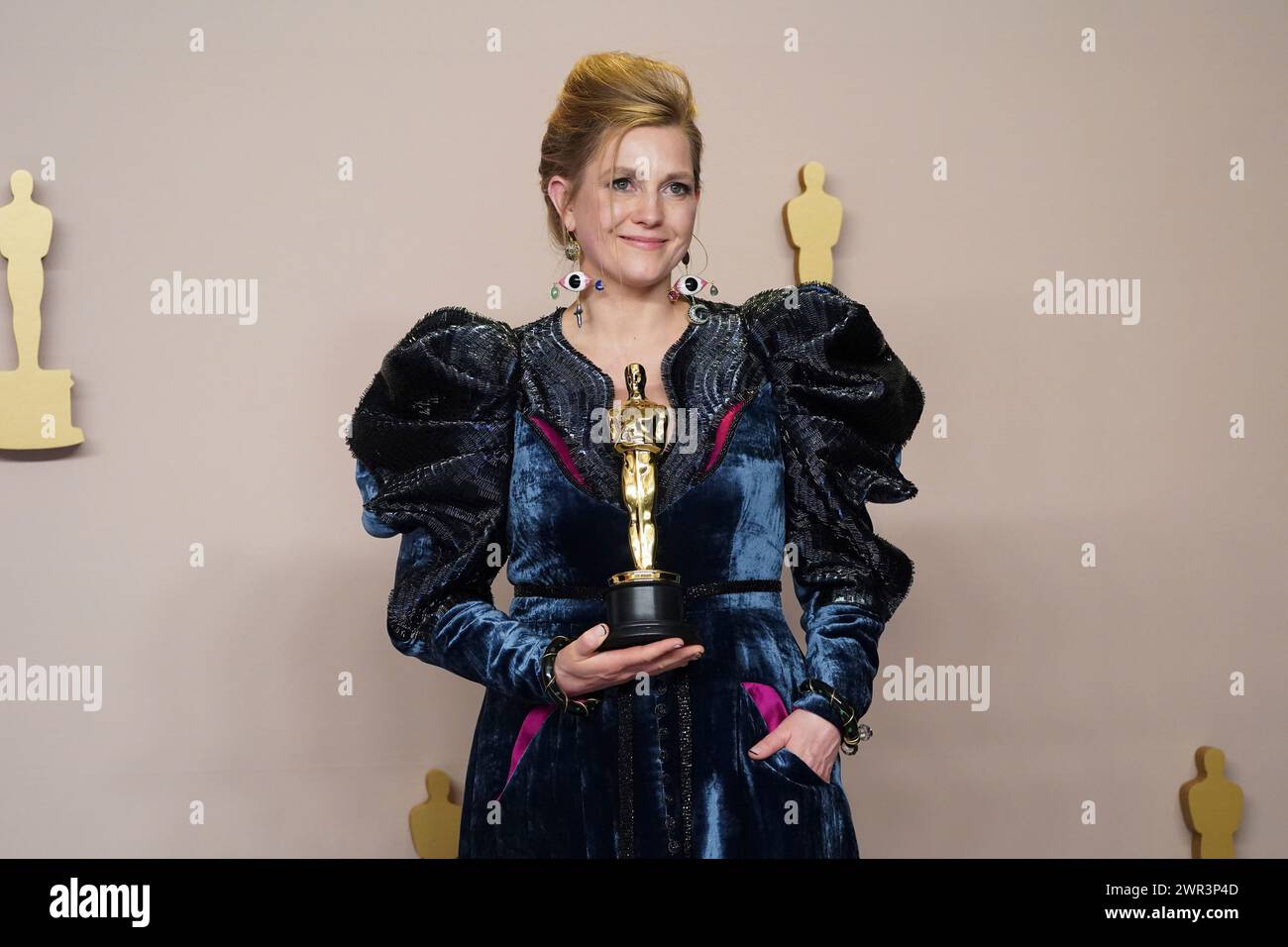 Holly Waddington poses with the award for best costume design for "Poor ...