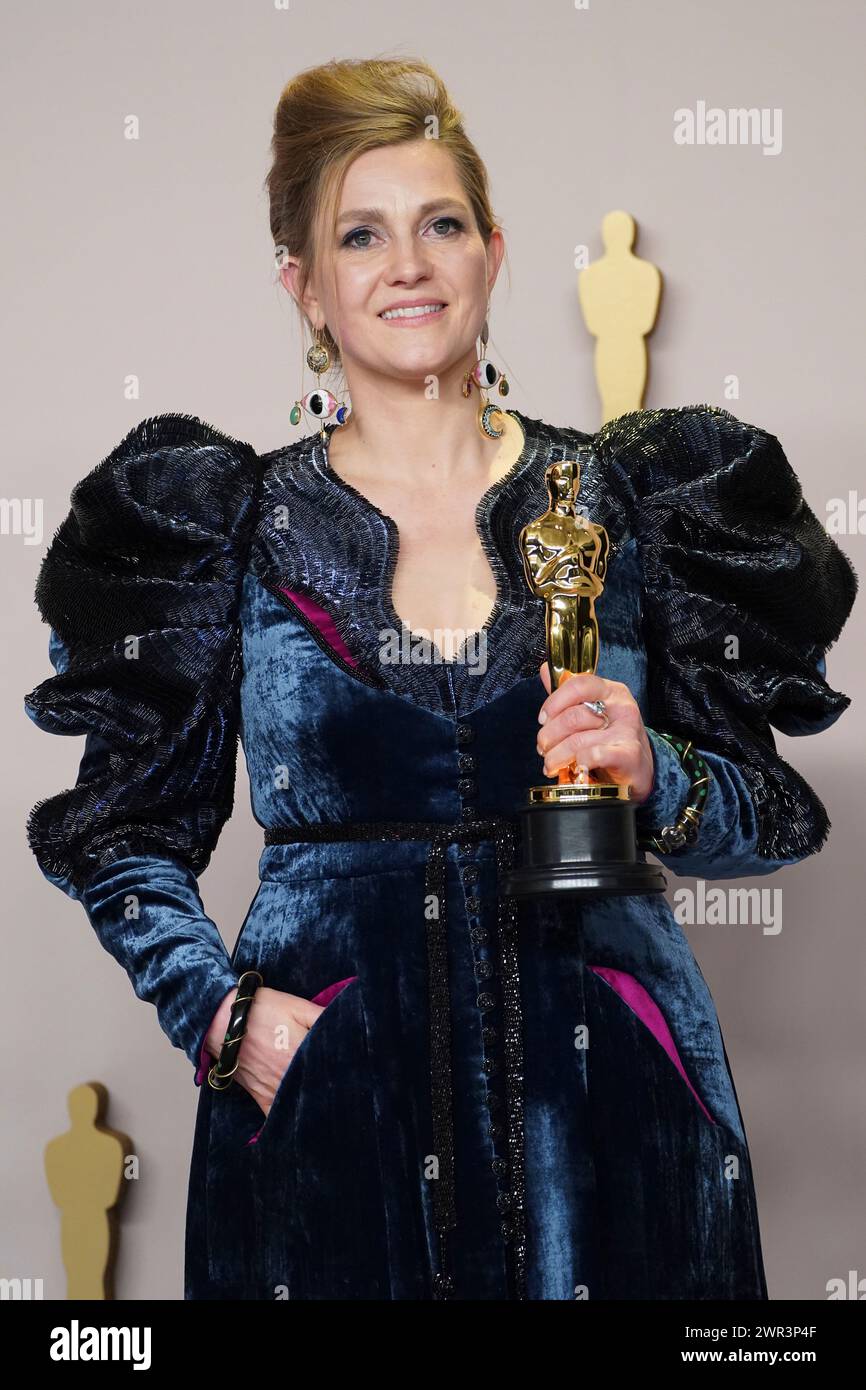 Holly Waddington poses with the award for best costume design for "Poor ...