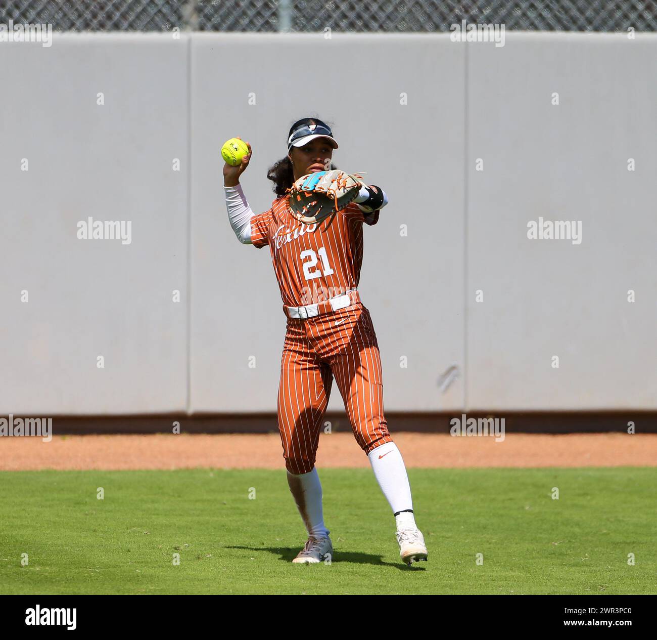 March 10, 2024: Texas outfielder Kayden Henry (21) throws back to the ...