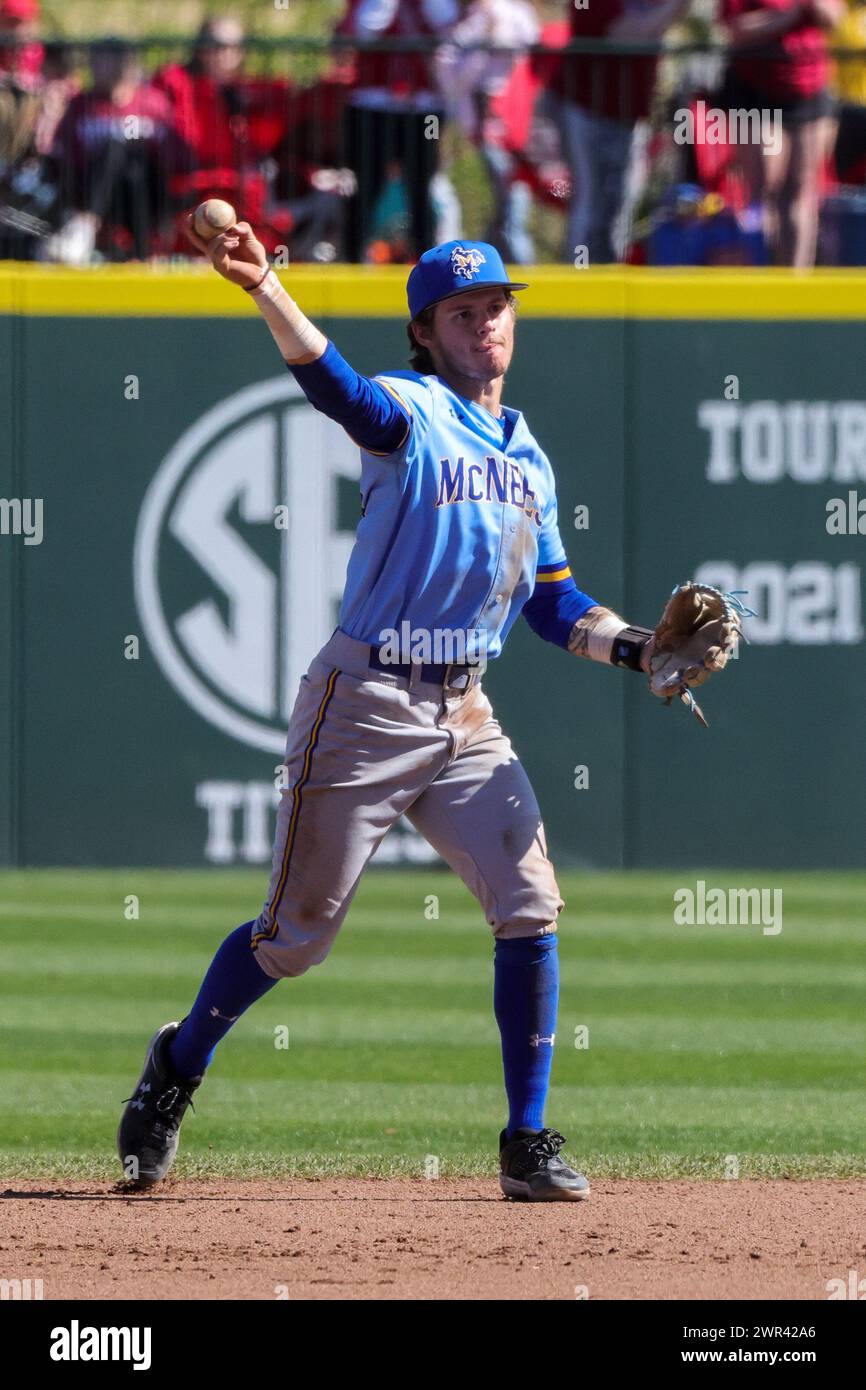 March 10, 2024: Easton Dowell #20 McNeese infielder makes a throw over ...