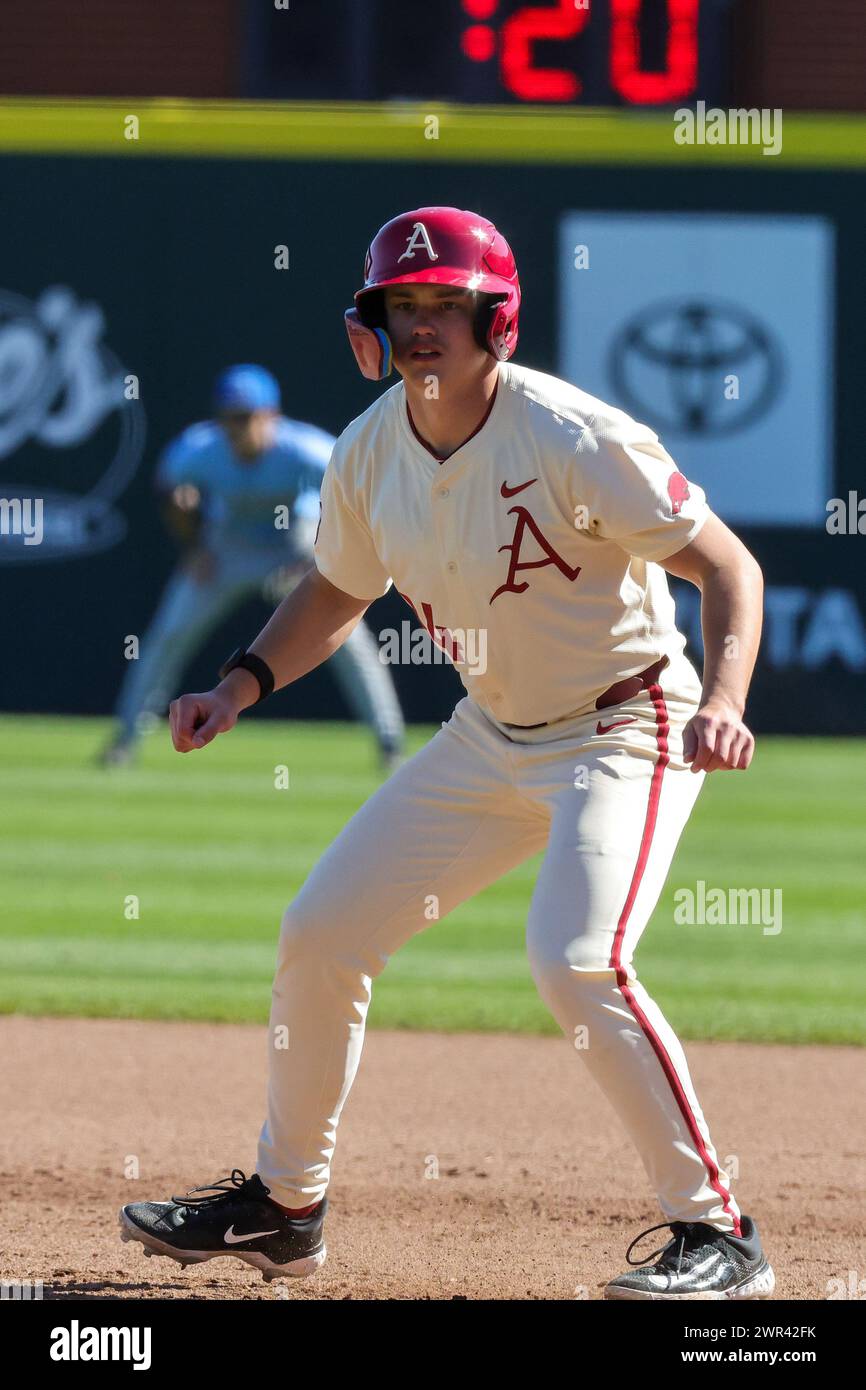 March 10, 2024: Hogs base runner Ross Lovich #14 works his way off of ...