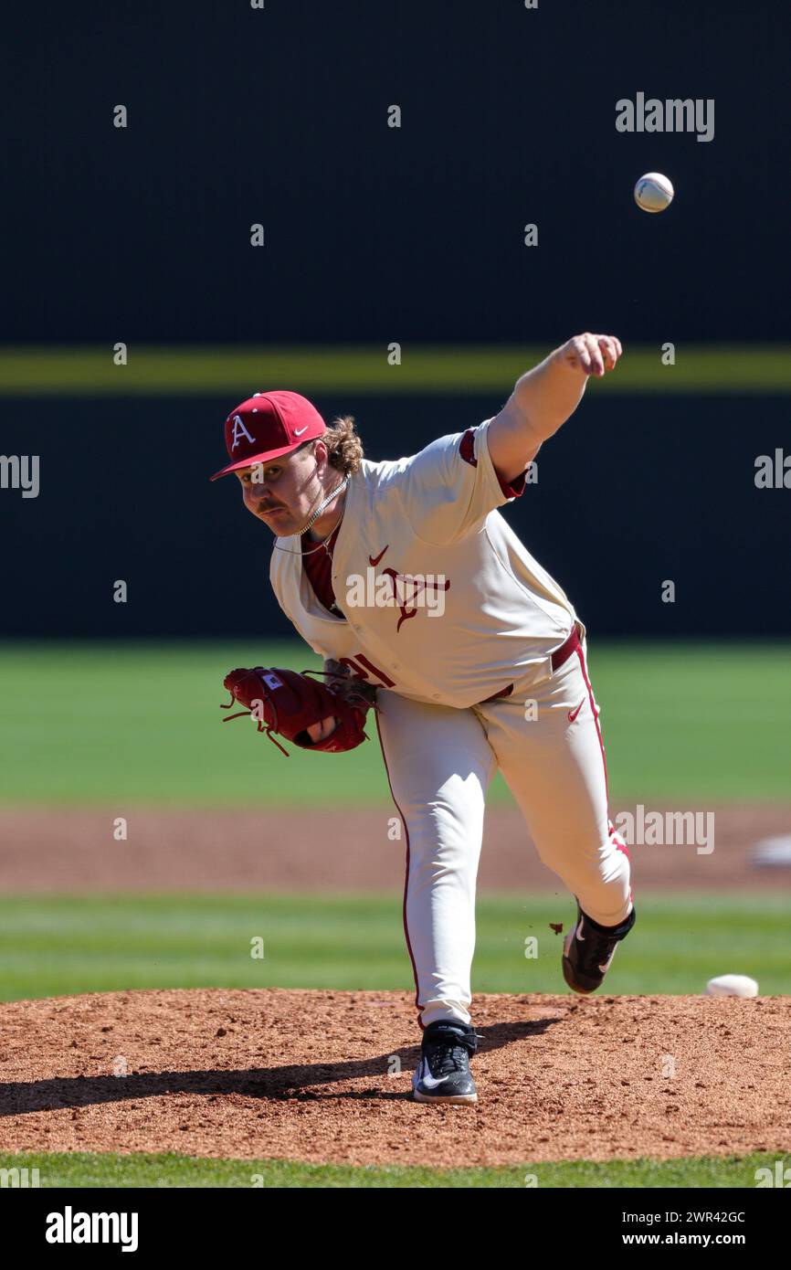 March 10, 2024: Razorback starting pitcher Mason Molina #21 releases a ...