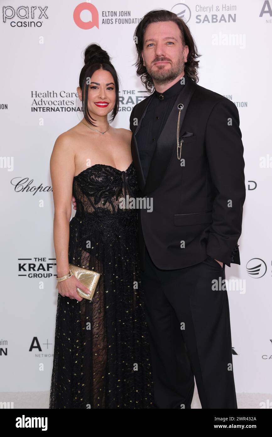 West Hollywood, Ca. 10th Mar, 2024. Jennifer HuYoung and JC Chasezat ...