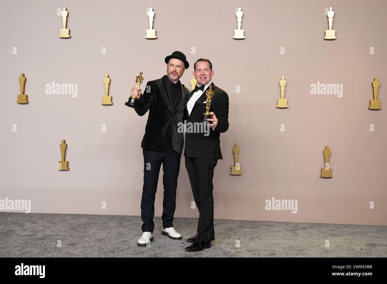 Tarn Willers, left, and Johnnie Burn pose in the press room with the ...