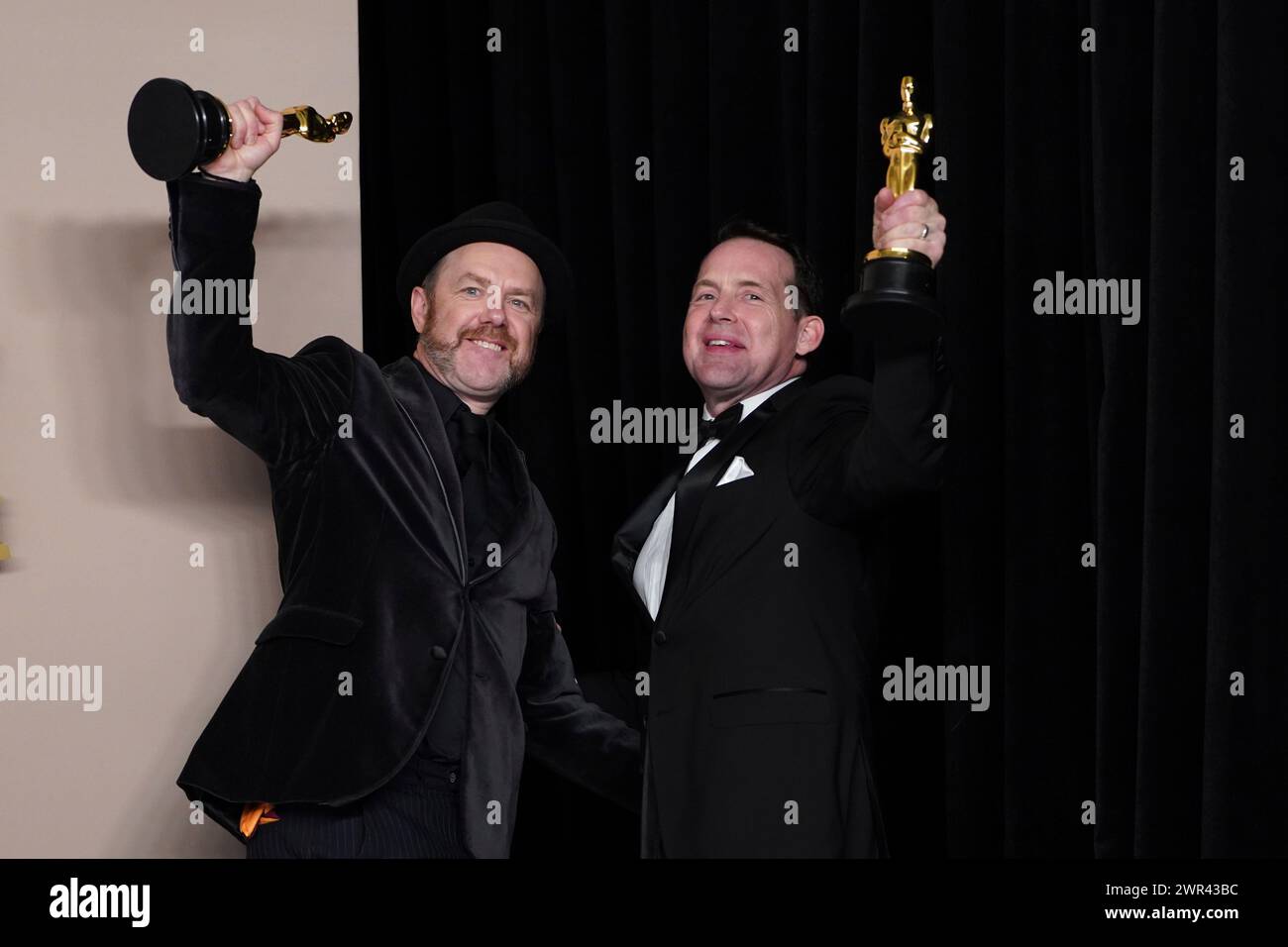 Tarn Willers, left, and Johnnie Burn pose in the press room with the ...