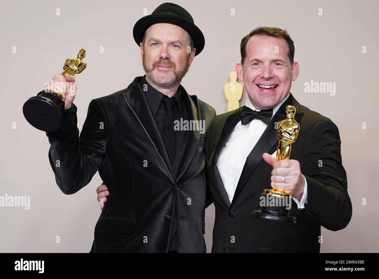 Tarn Willers, left, and Johnnie Burn pose in the press room with the ...